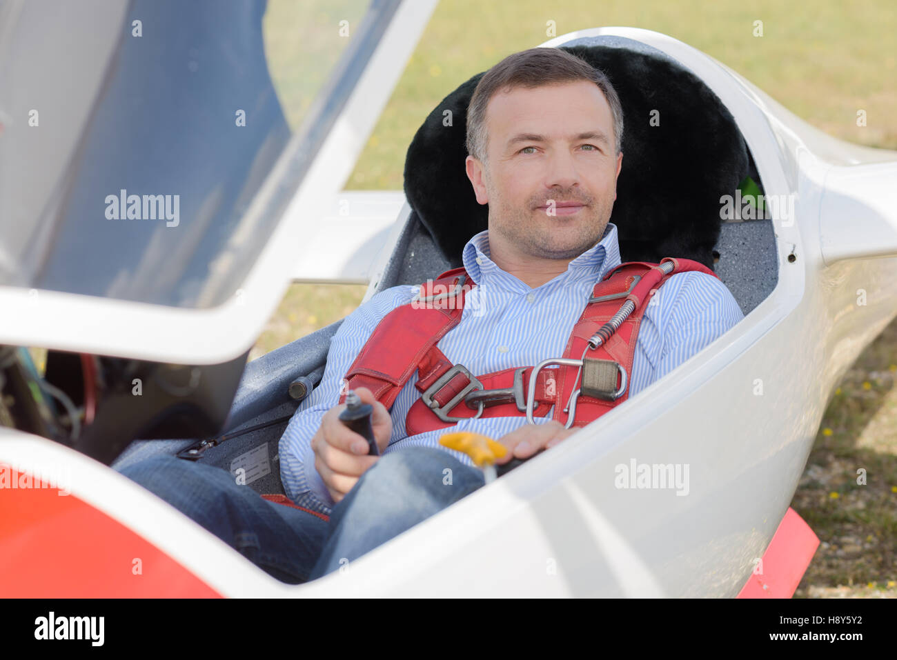 a man alone on a plane Stock Photo - Alamy