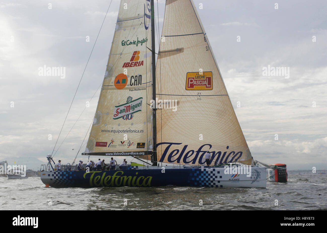 Sailboat mounting a race buoy Stock Photo - Alamy