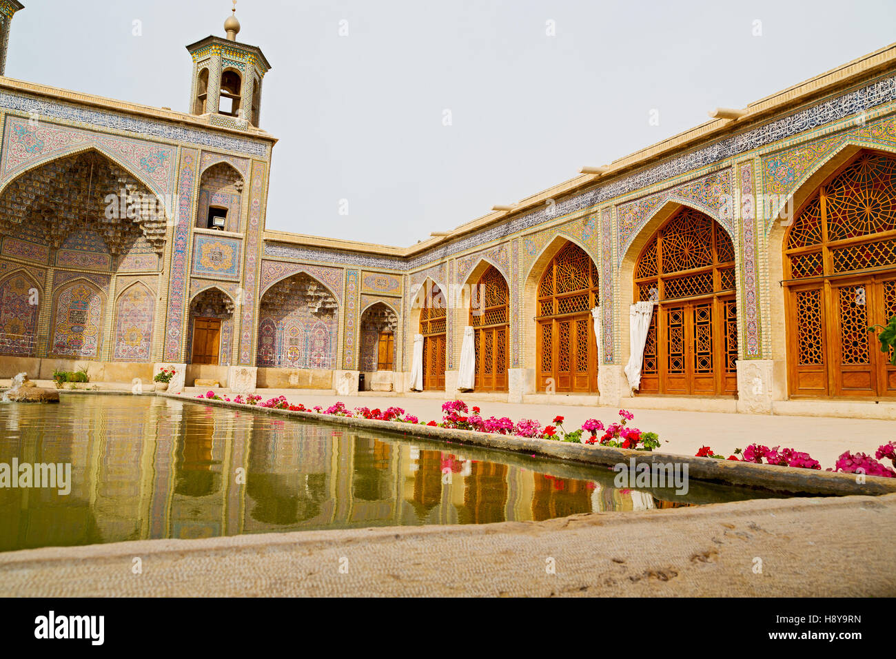 in iran the old mosque and traditional wall tile incision near minaret ...