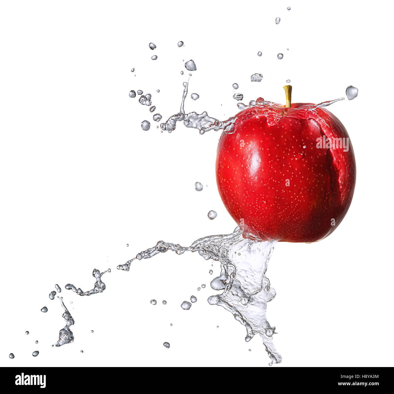 Water splash with apple isolated Stock Photo - Alamy