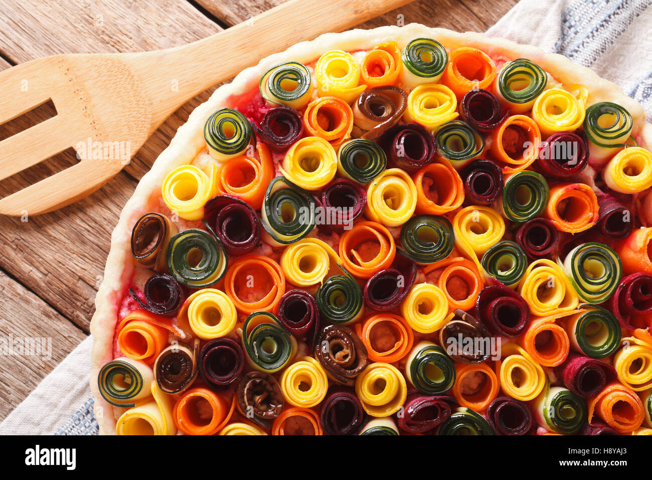 Healthy food: vegetable tart close-up on the table. horizontal view ...