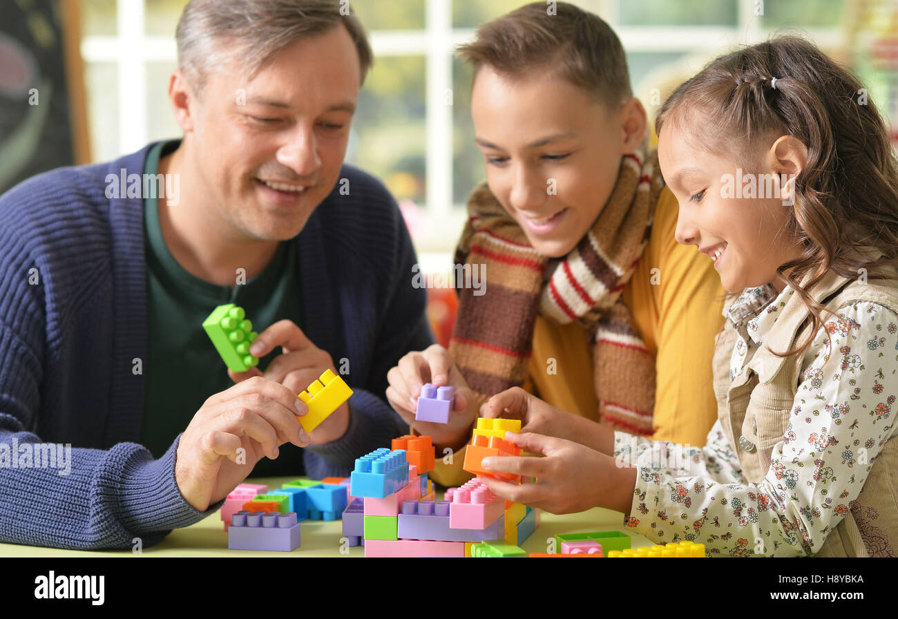 Father with kids play Stock Photo - Alamy