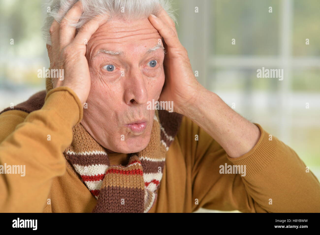 Stressed senior man Stock Photo - Alamy