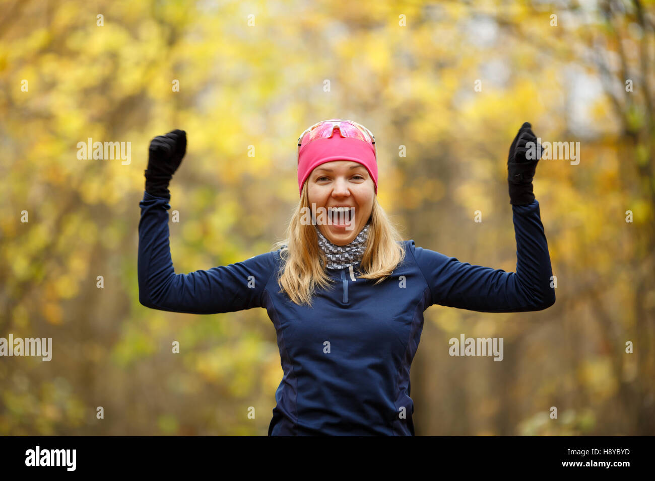 Young happy woman doing exercises Stock Photo - Alamy