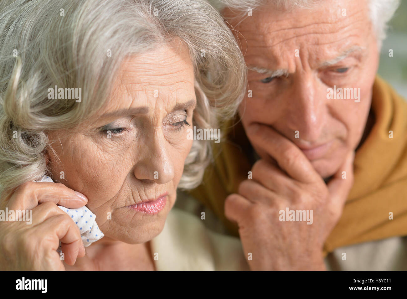 Old couple close up sad hi-res stock photography and images - Alamy