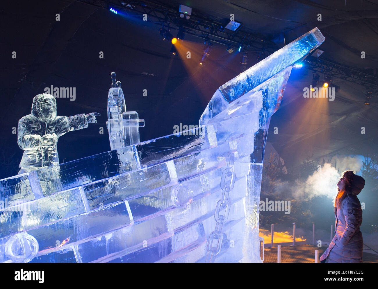 A visitor views an ice sculpture of a ship at the launch of Hyde Park ...