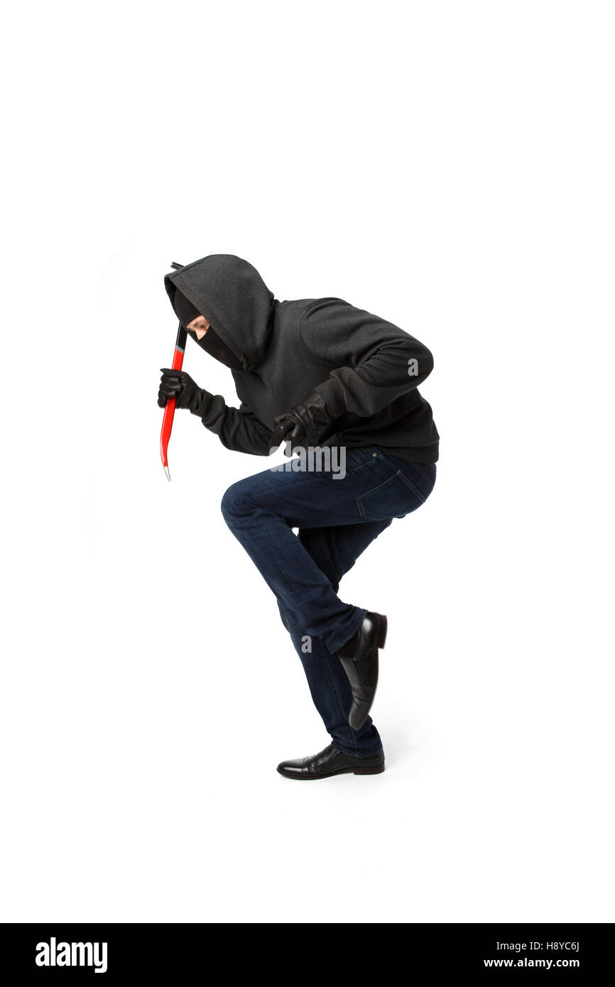 Breaking in burglar Cut Out Stock Images & Pictures - Alamy