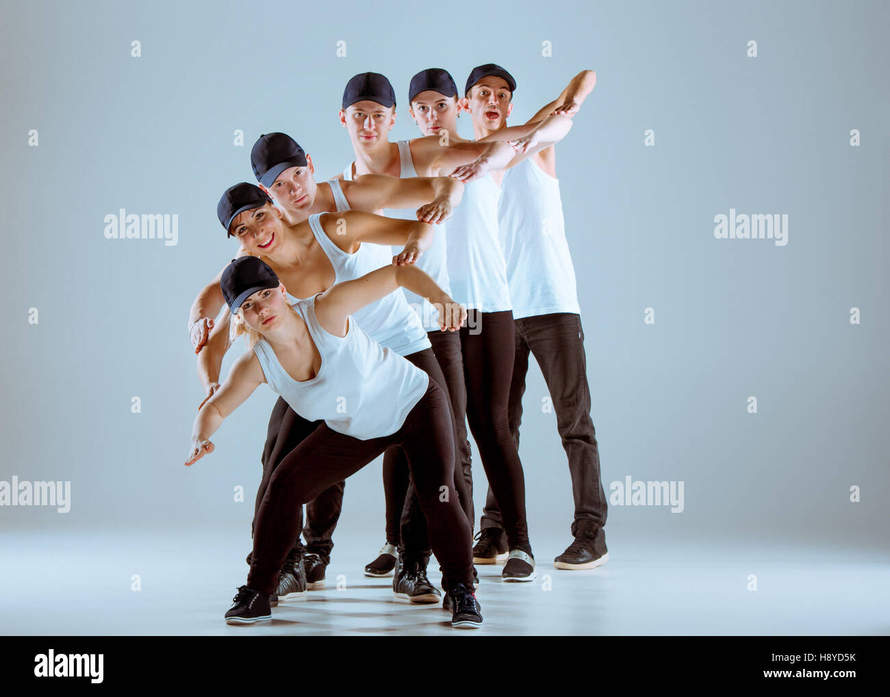 Group of men and women dancing hip hop choreography Stock Photo - Alamy