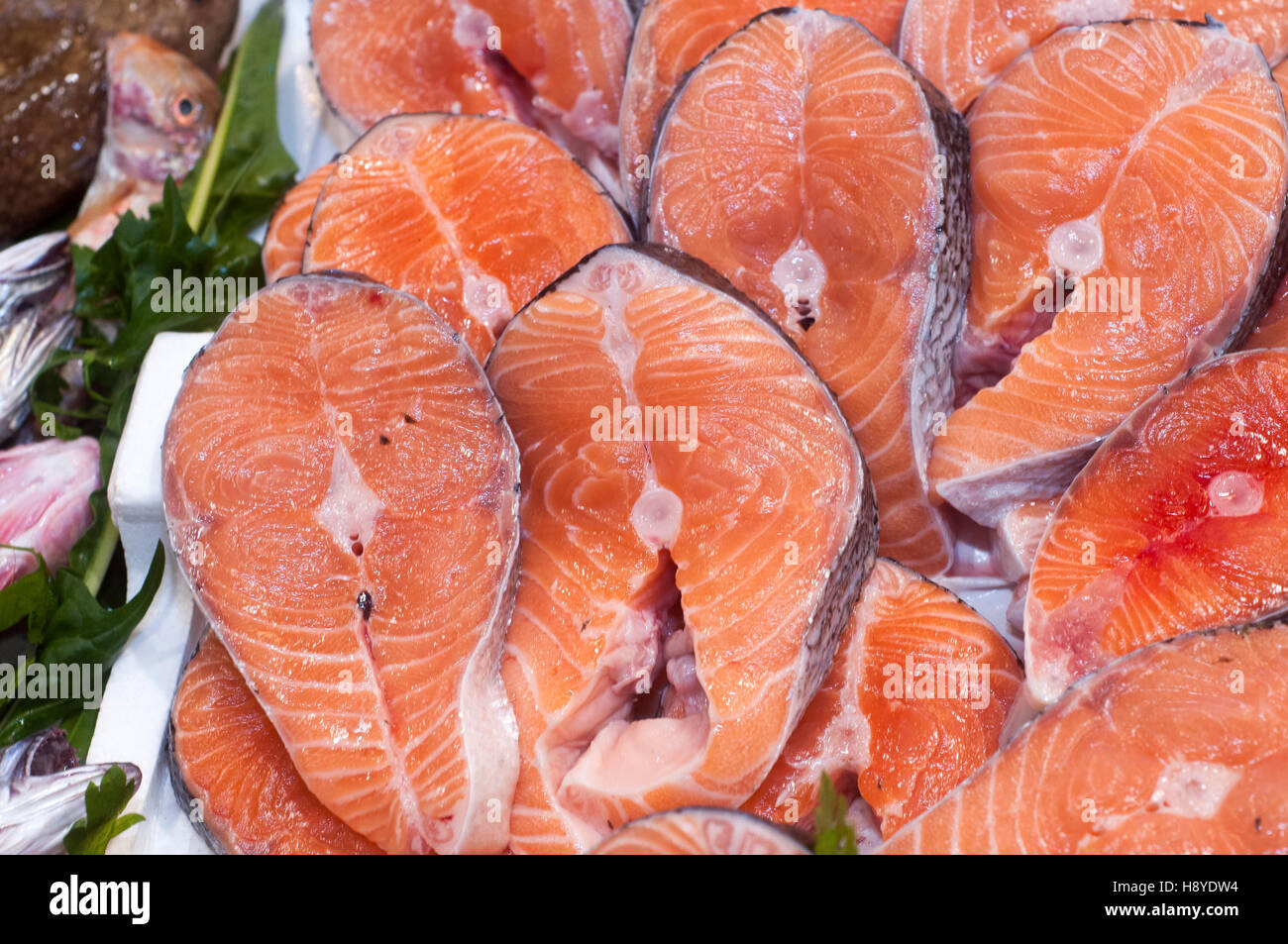 Display of salmon steaks in fish market Stock Photo - Alamy