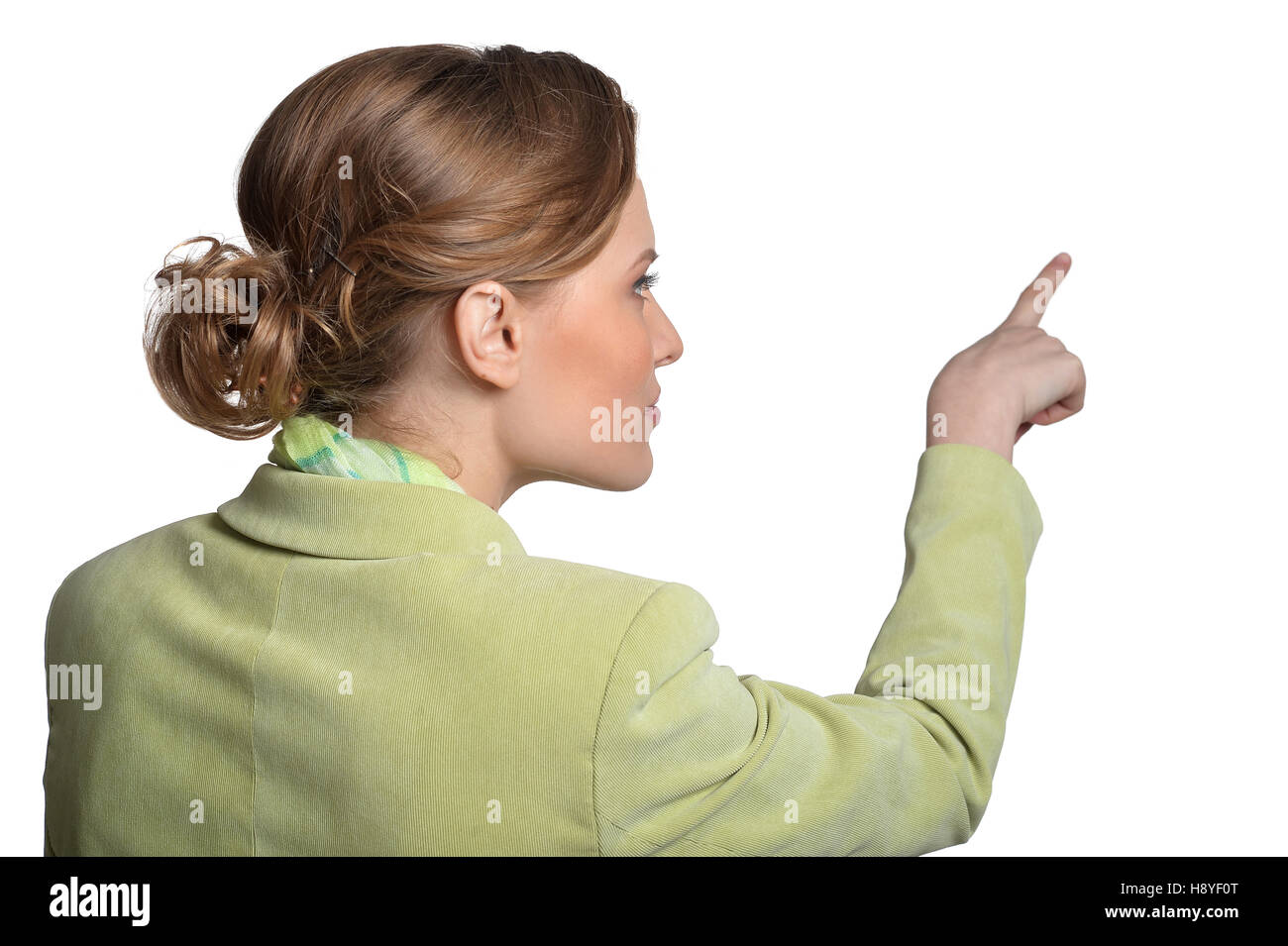 Young woman pointing Stock Photo - Alamy