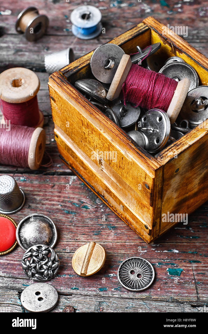 Retro wooden box with buttons and thread Stock Photo - Alamy