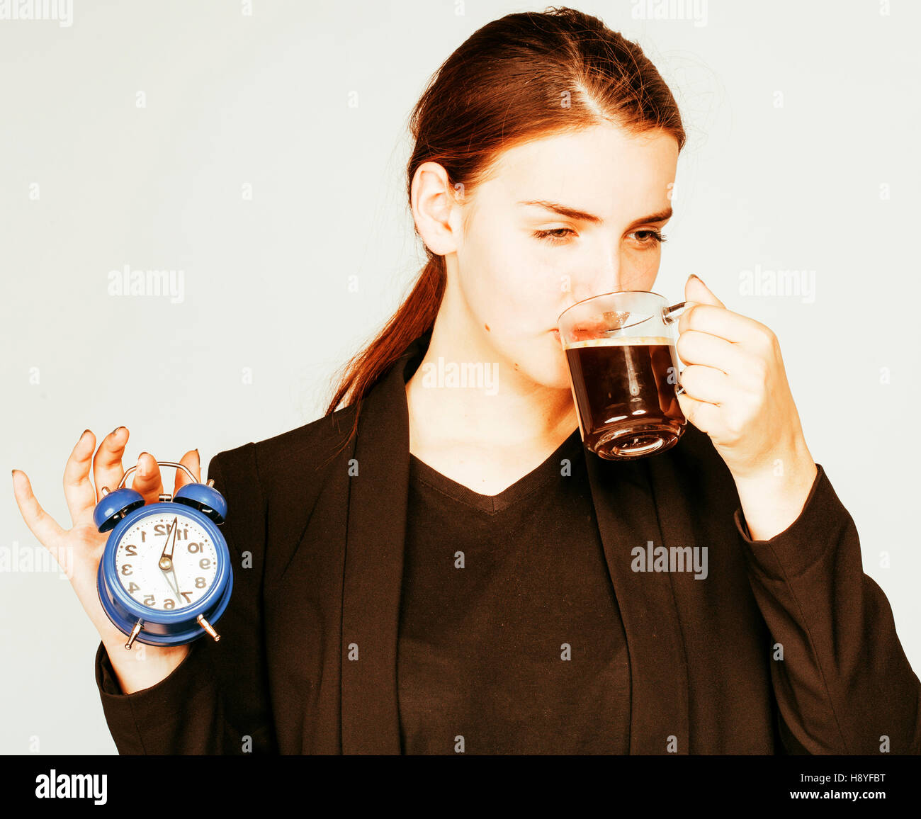 young beauty woman in business style costume waking up for work Stock ...