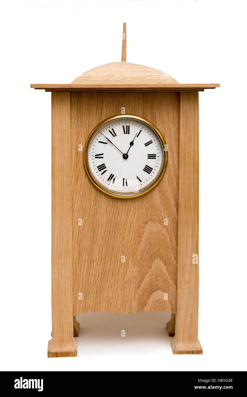 Crafts Charles Voysey design oak mantel clock Stock Photo - Alamy