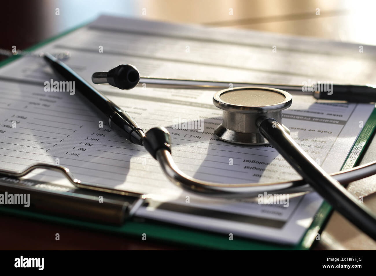 stethoscope medical documents pen Stock Photo - Alamy