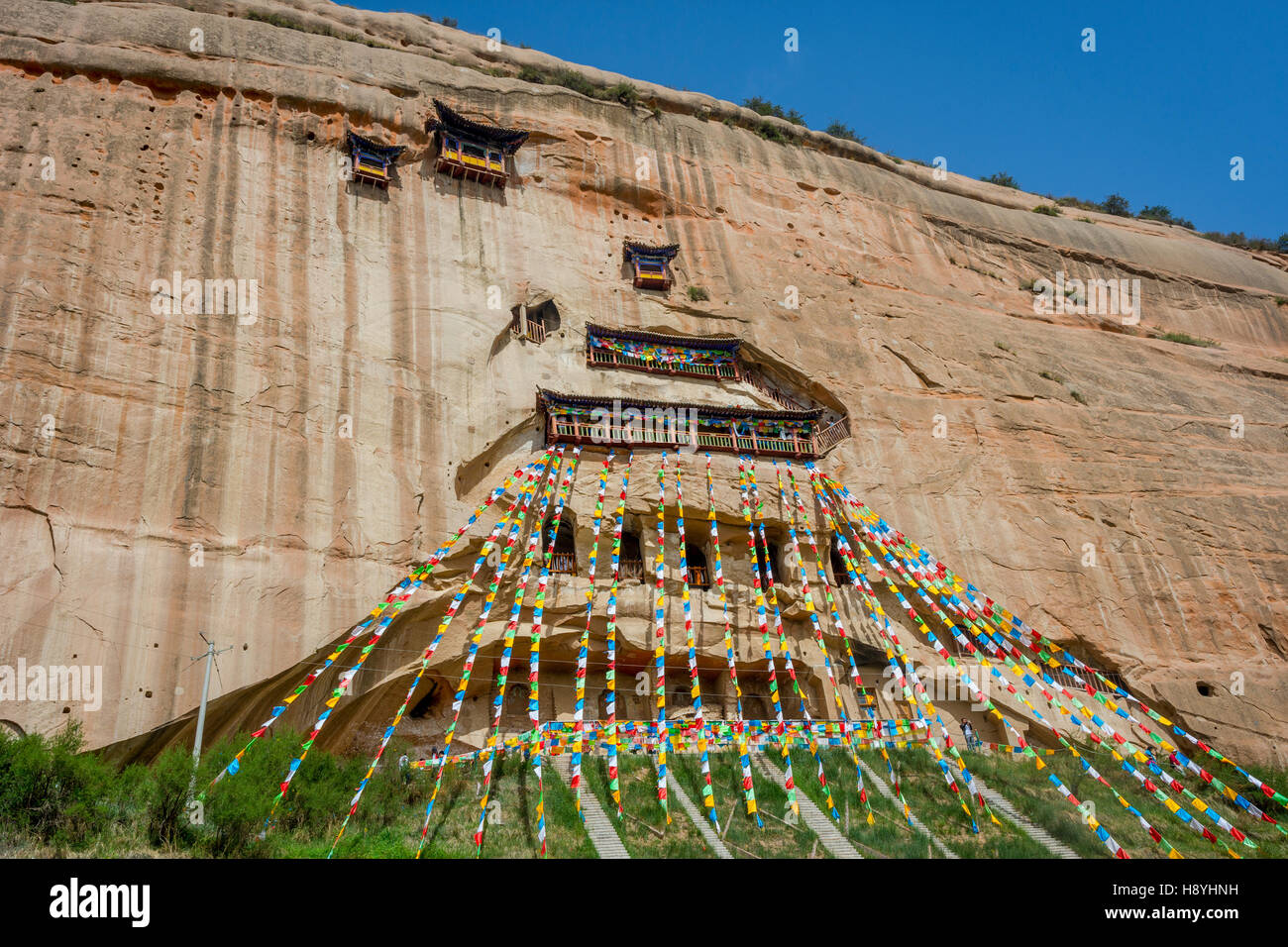 Mati Si cave temple with colorful praying buddhist flags, Zhangye ...