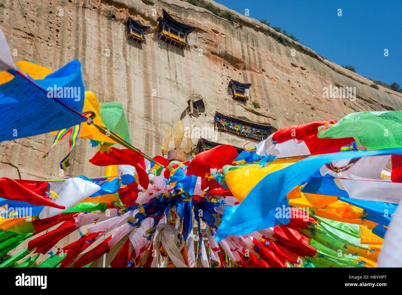 Mati Si cave temple with colorful praying buddhist flags, Zhangye ...