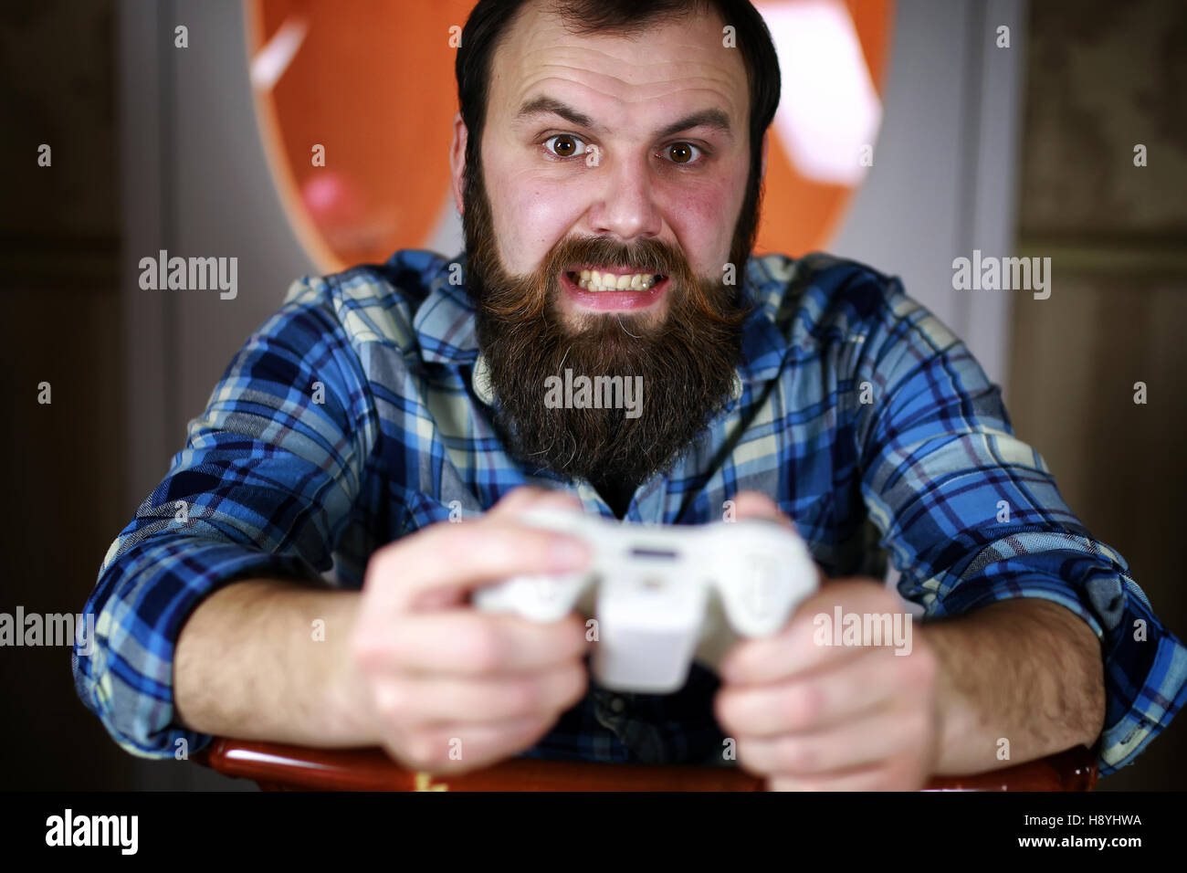 man bearded video game play Stock Photo - Alamy