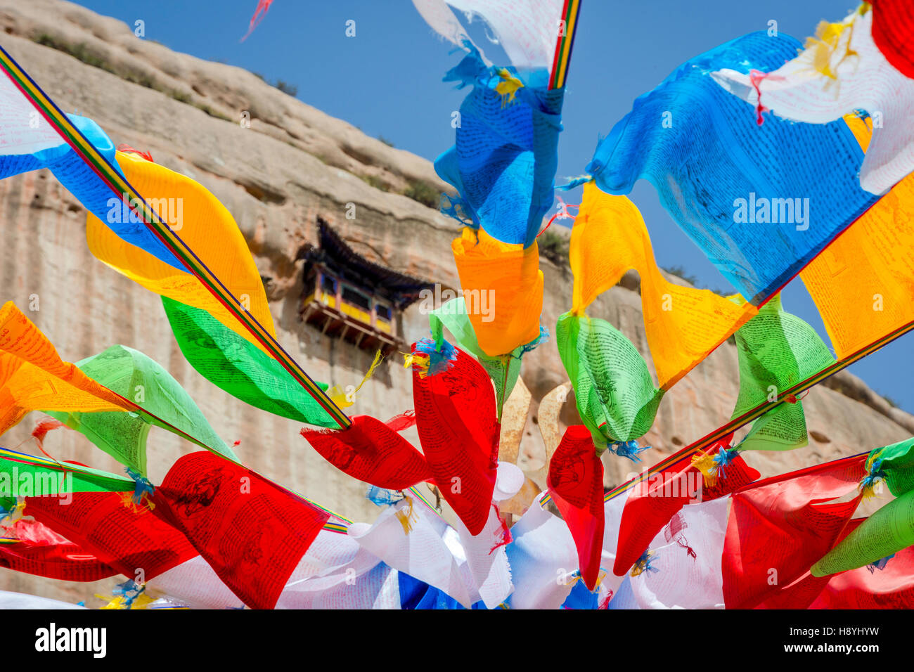 Mati Si cave temple with colorful praying buddhist flags, Zhangye ...