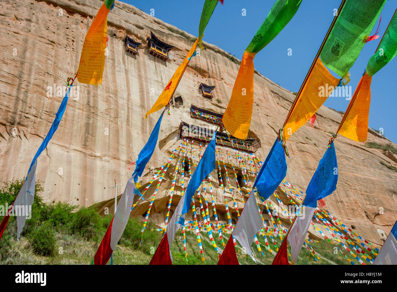 Mati Si cave temple with colorful praying buddhist flags, Zhangye ...