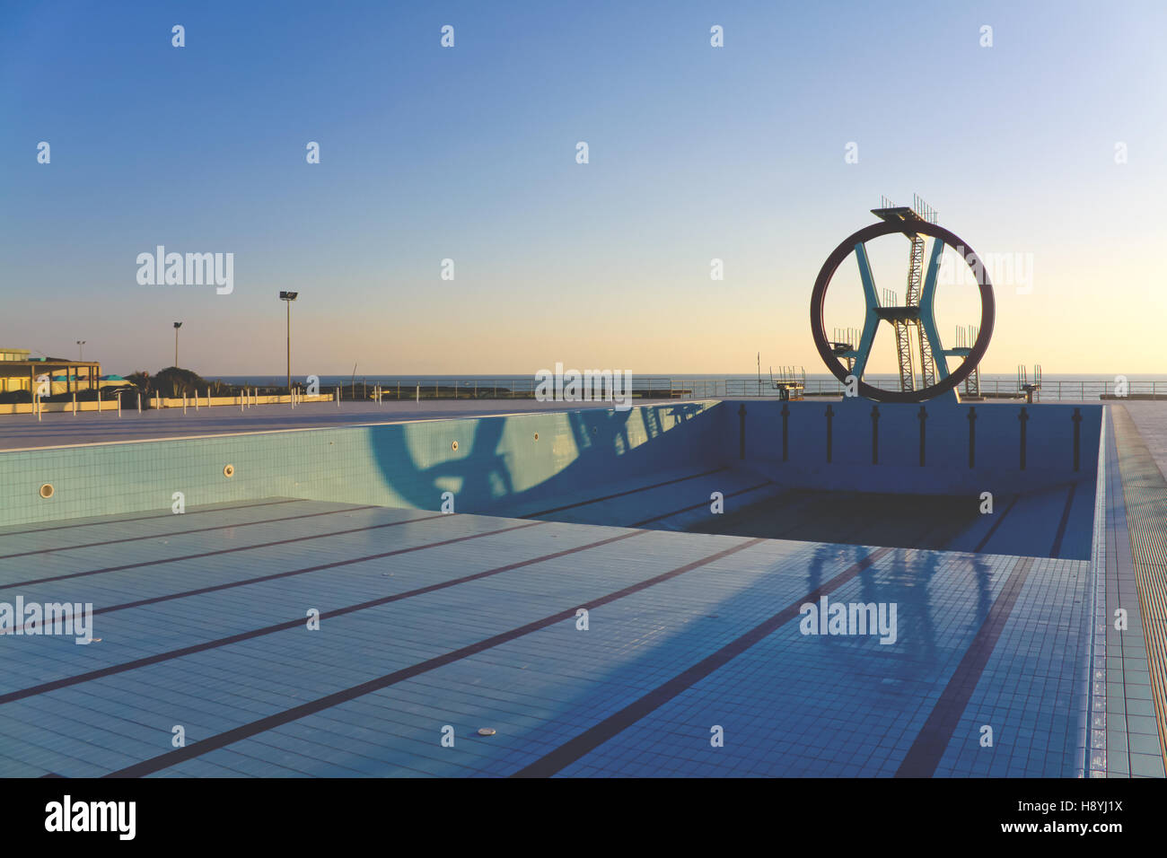 Big Diving board structure and pool in winter Stock Photo - Alamy