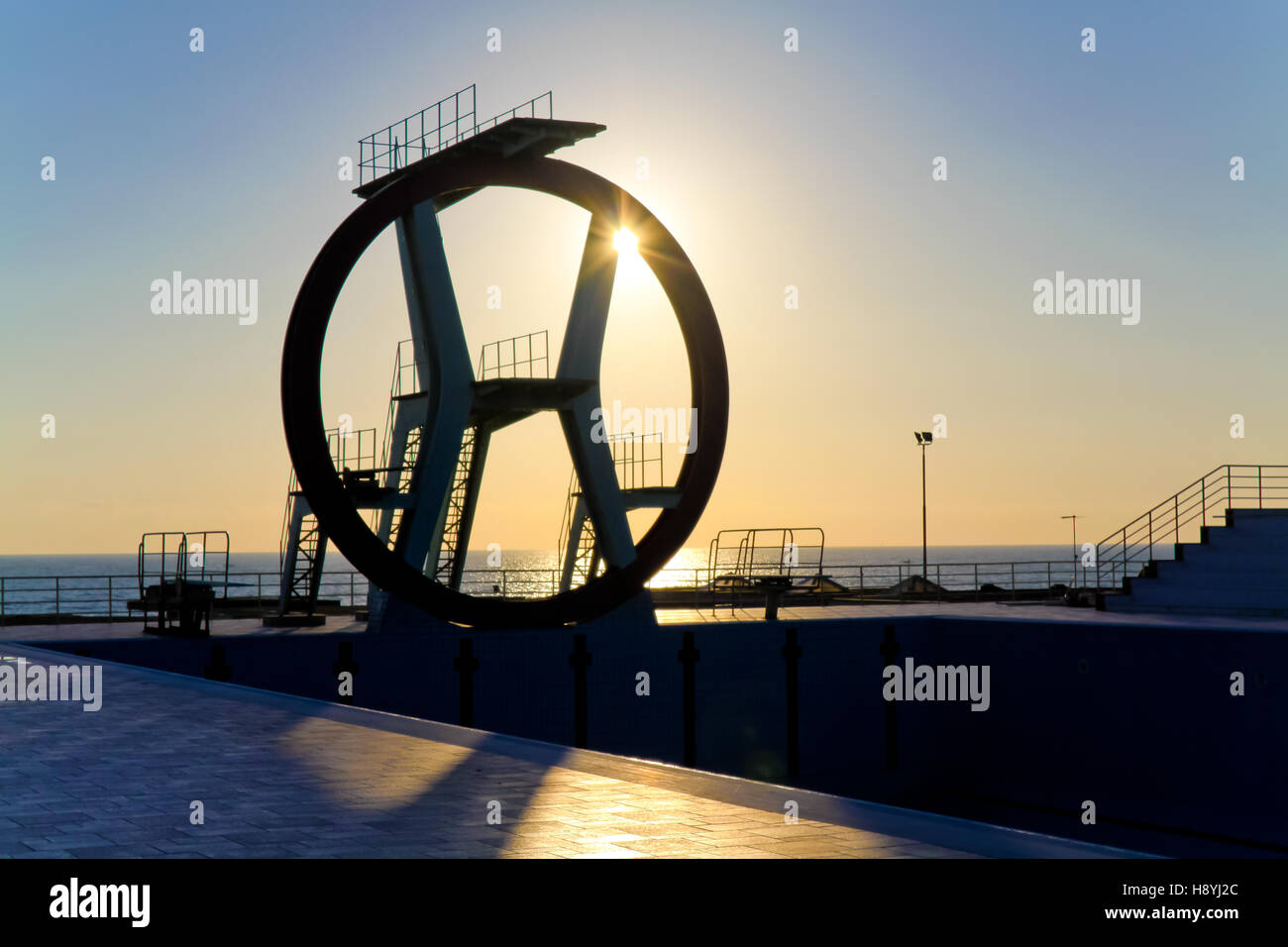Big Diving board structure and pool in winter Stock Photo - Alamy