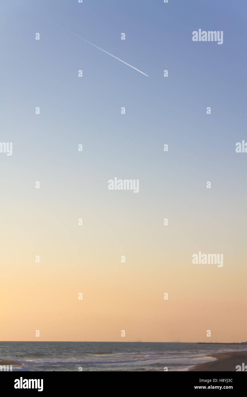 twilight sky gradient with jet trails Stock Photo - Alamy