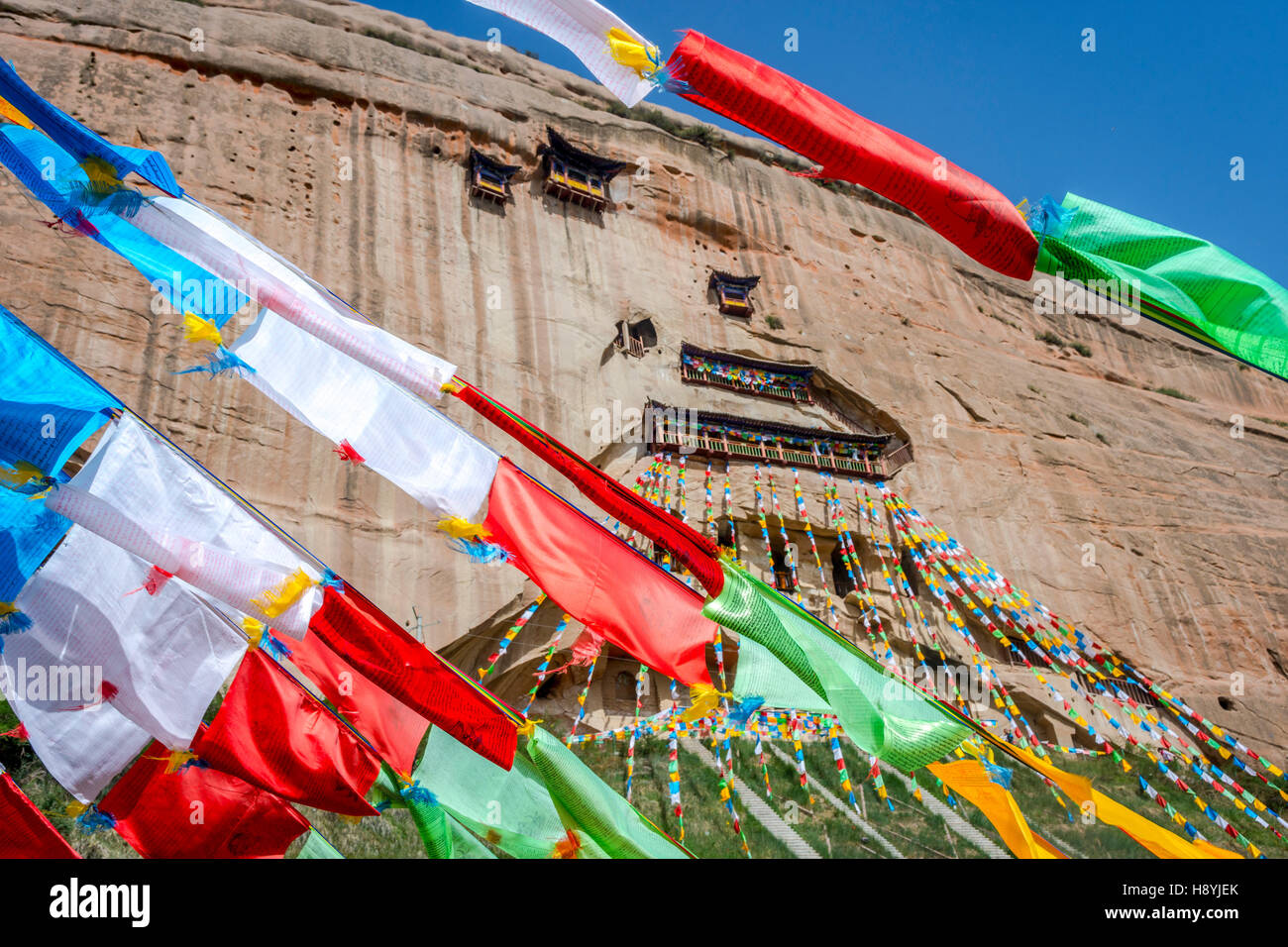 Mati Si cave temple with colorful praying buddhist flags, Zhangye ...