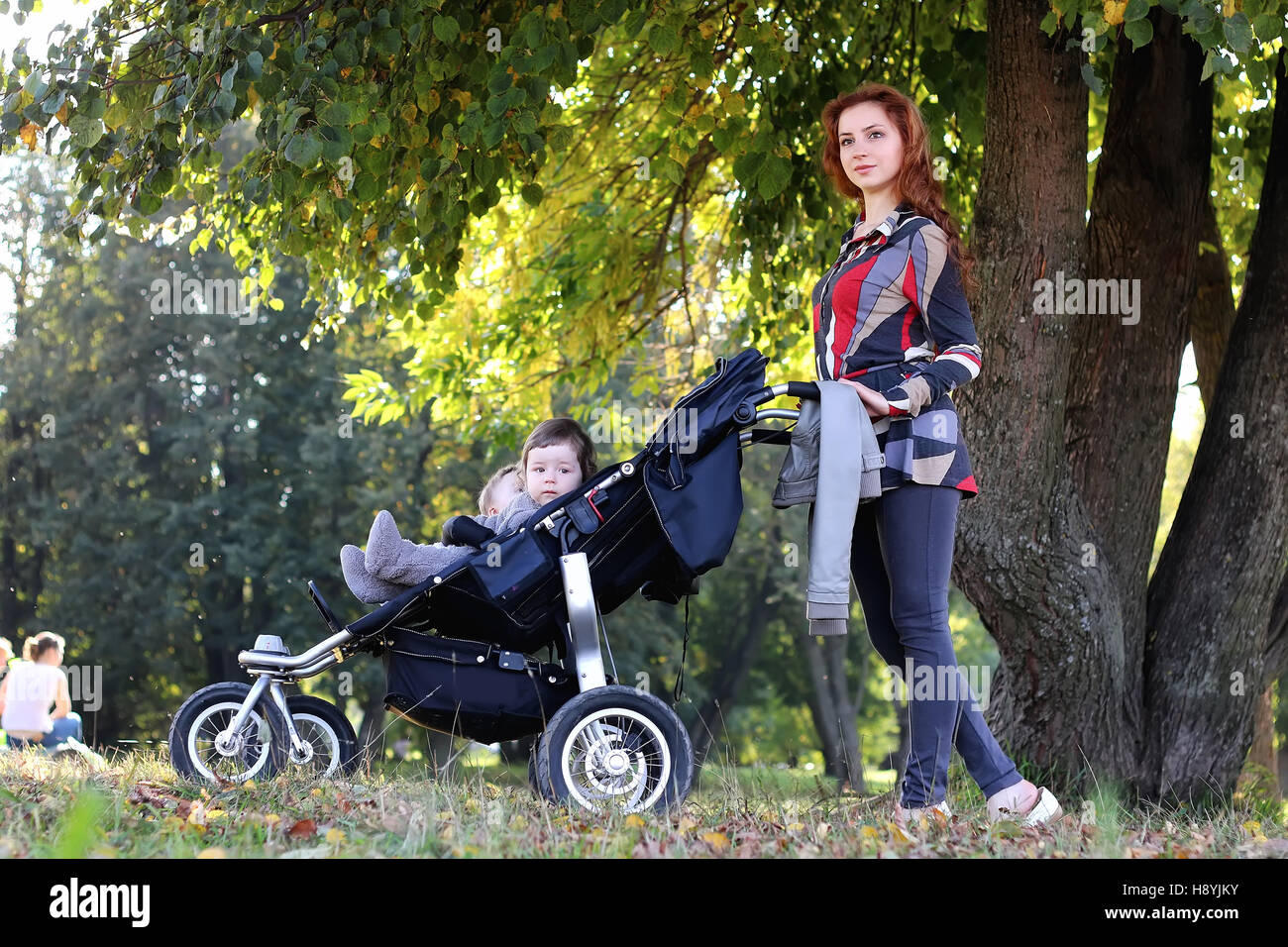 women walk stroller summer Stock Photo - Alamy