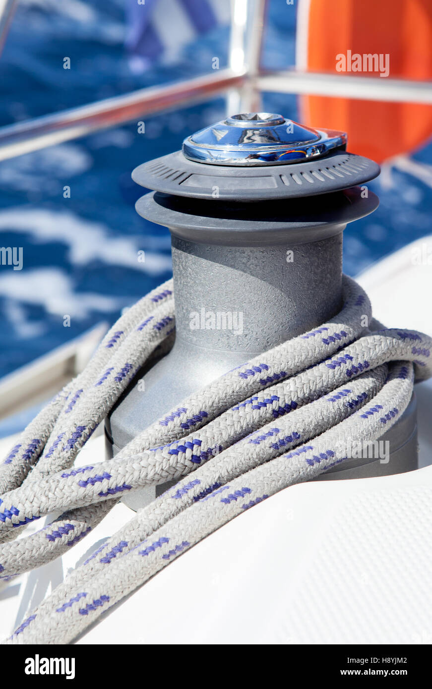 Winch with blue rope on a yacht Stock Photo - Alamy