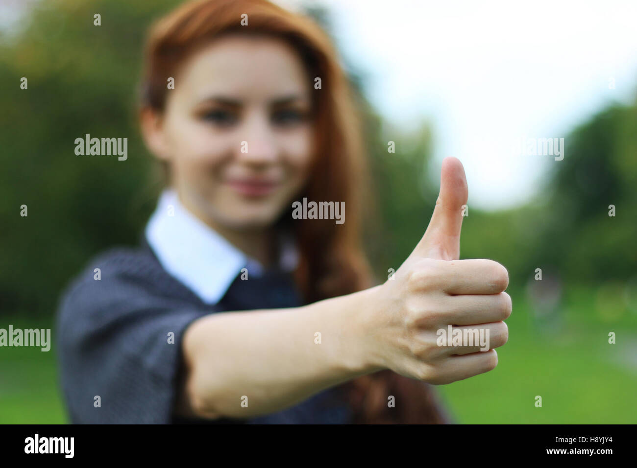 red-haired girl arm symbol Stock Photo - Alamy