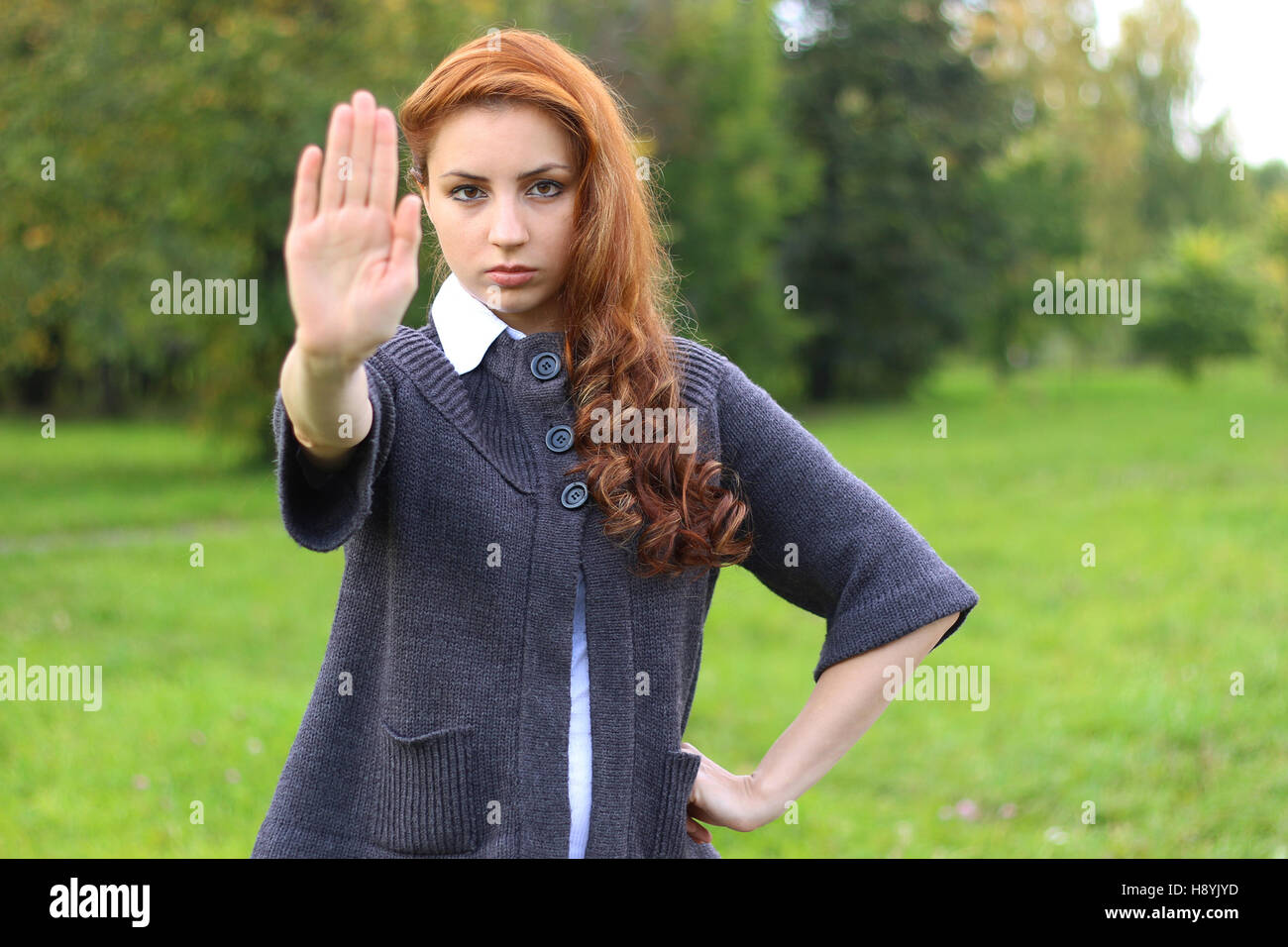 red-haired girl arm symbol Stock Photo - Alamy