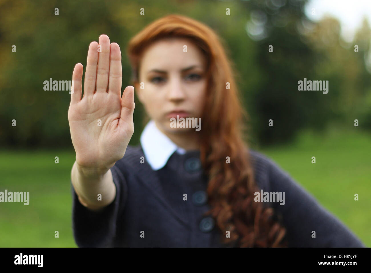 red-haired girl arm symbol Stock Photo - Alamy