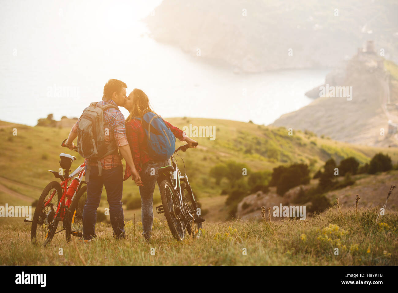 Young couple riding bikes in hi-res stock photography and images - Alamy
