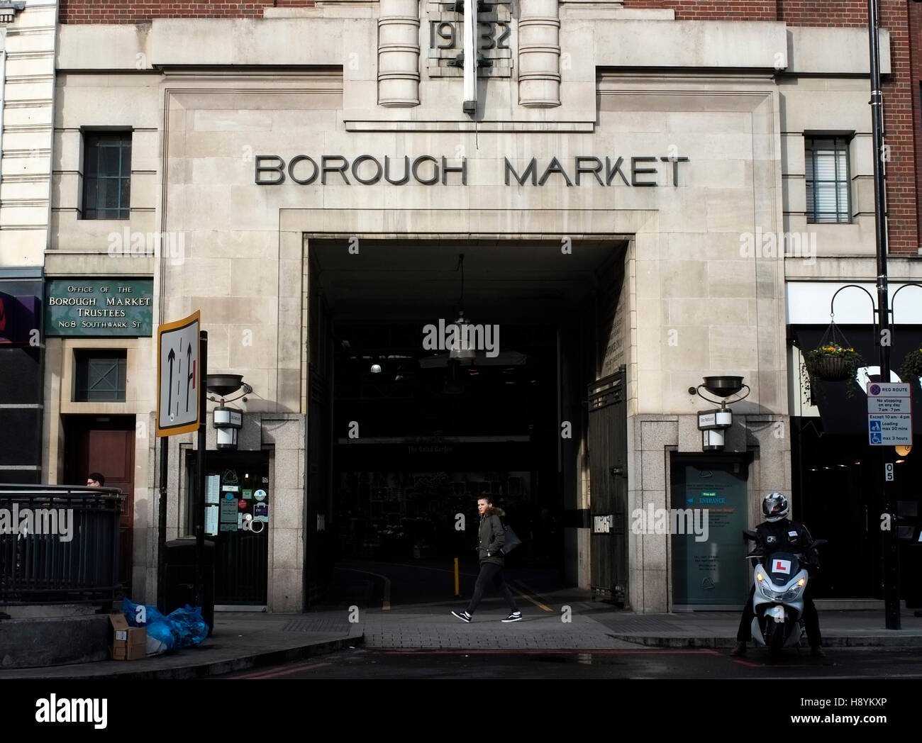 A man walks past the entrance to Borough Market, London, Britain ...