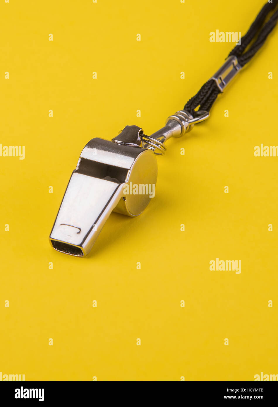 Coaches chrome sports whistle on a rope Stock Photo - Alamy