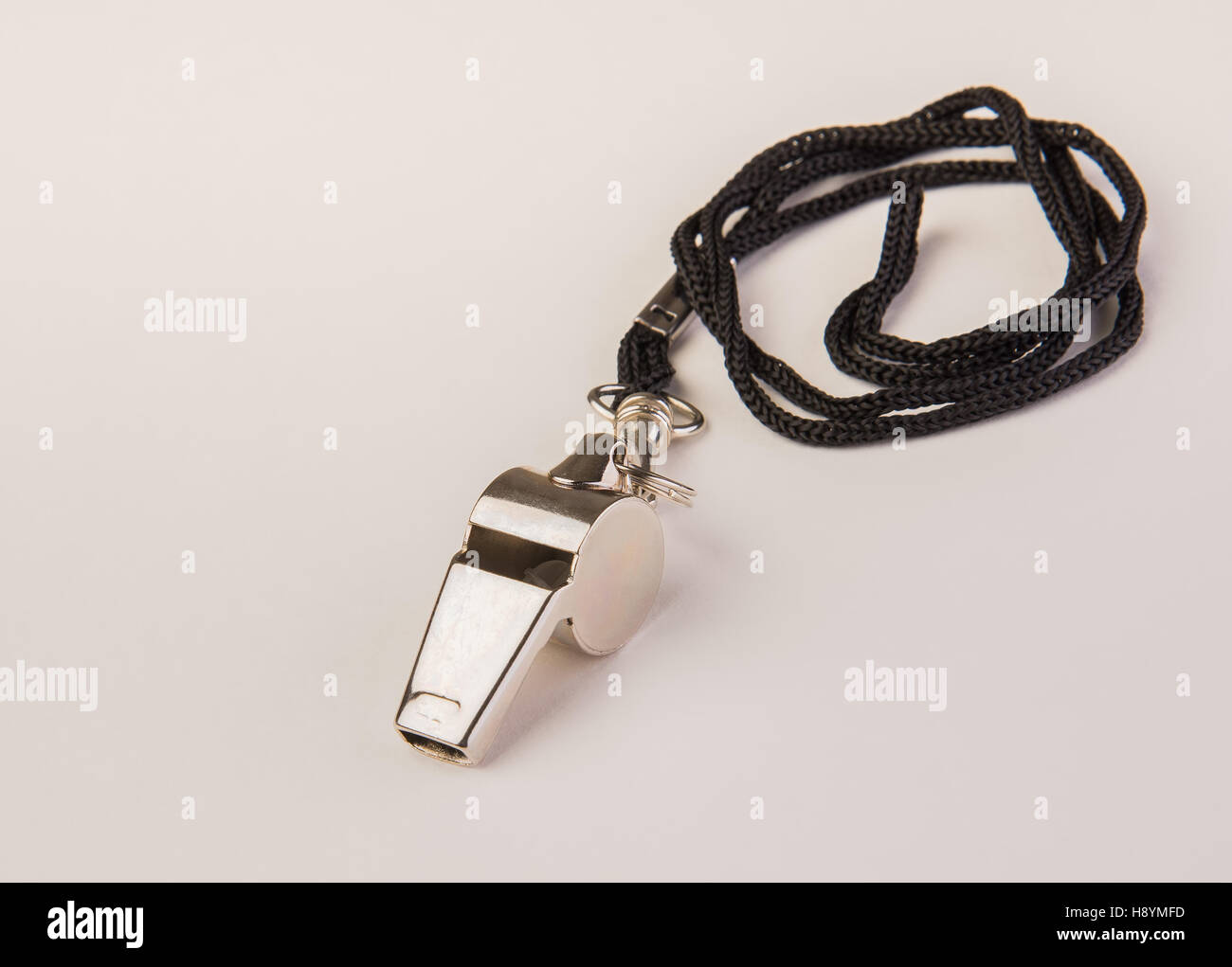 Coaches chrome sports whistle on a rope Stock Photo - Alamy