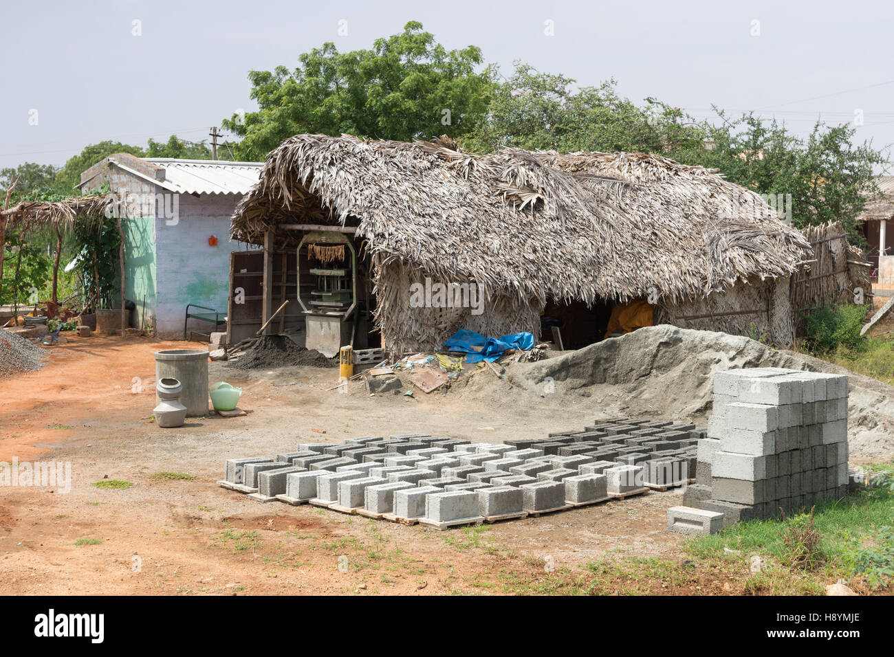Rural one-man cinder block manufacture Stock Photo - Alamy
