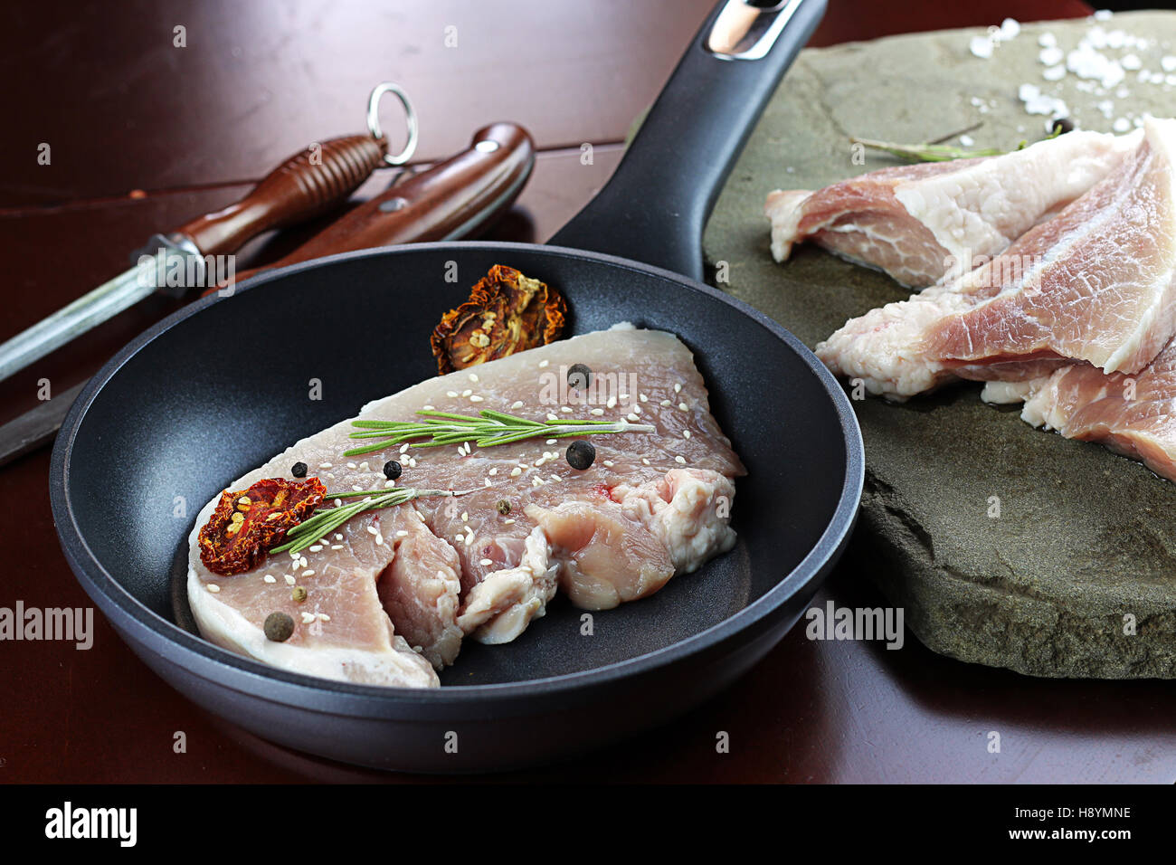 steak in a frying pan Stock Photo - Alamy
