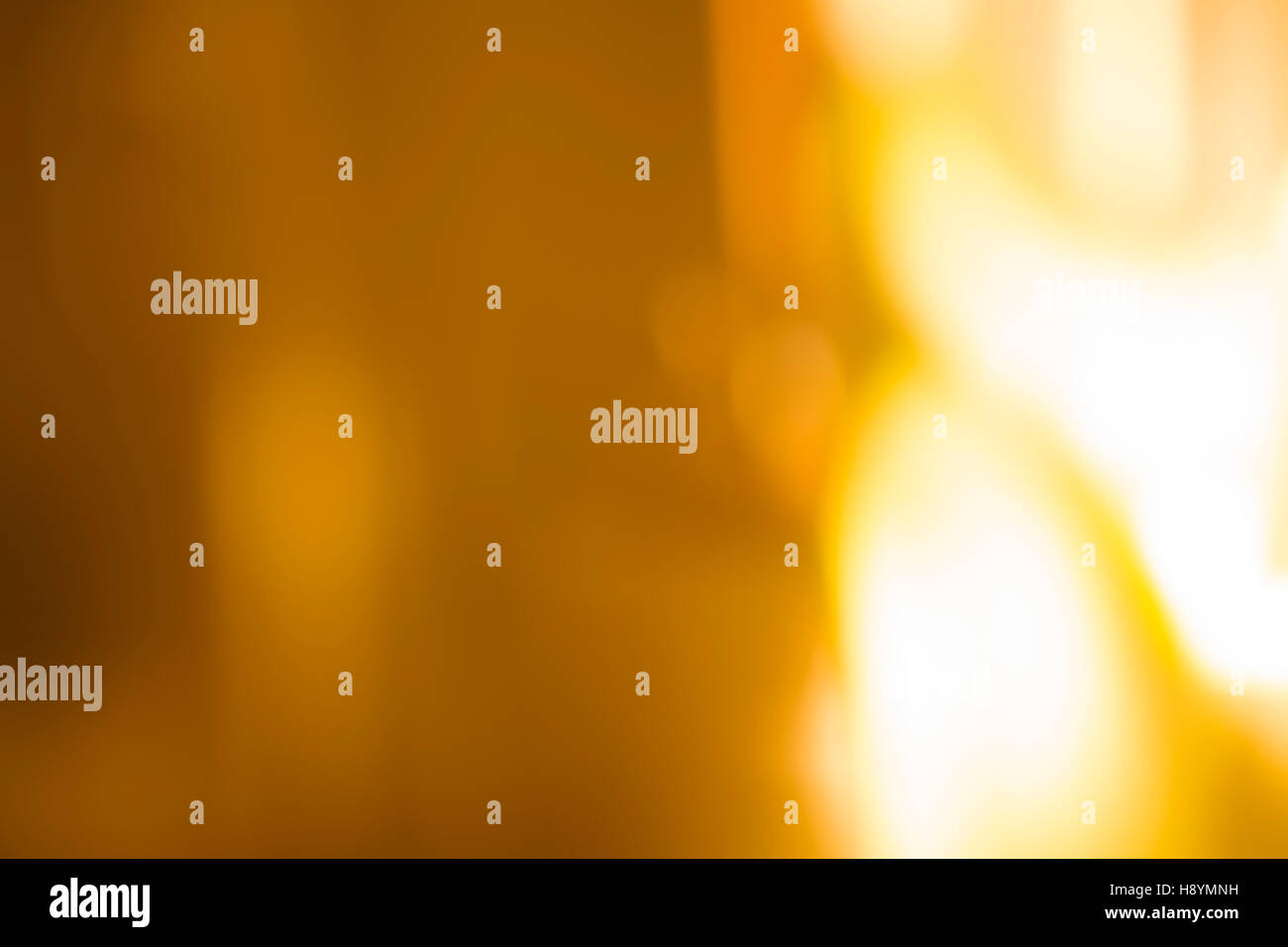 Golden overlay background of golden lights with bokeh effect. Includes ...