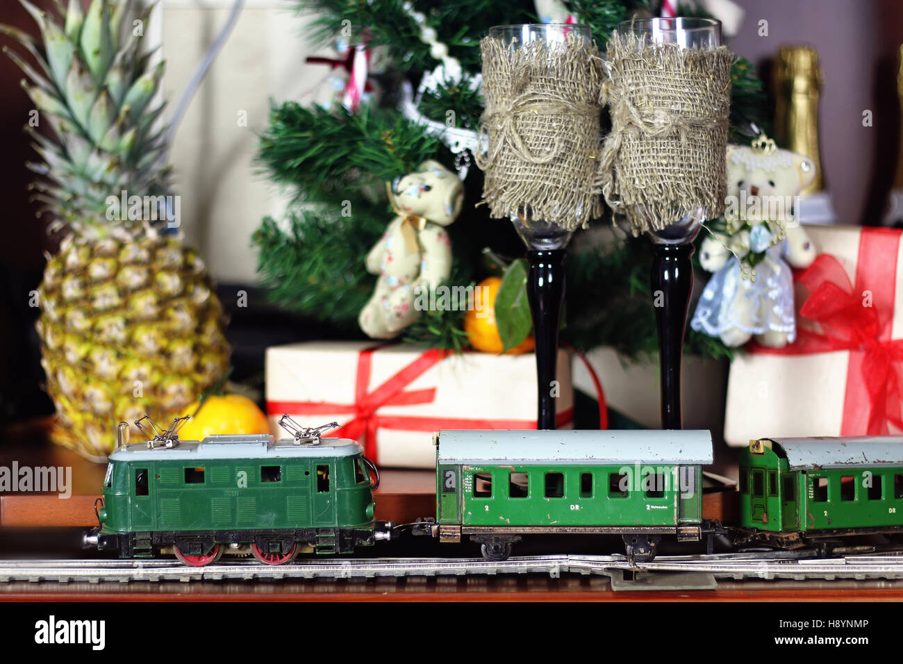 train under tree gift Stock Photo - Alamy