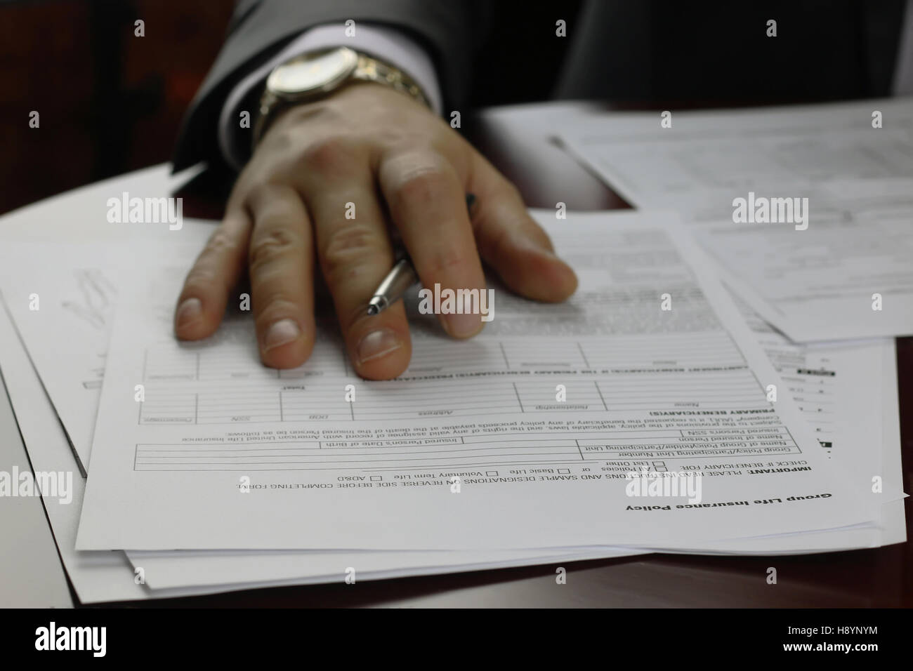 hand signed insurance Stock Photo - Alamy
