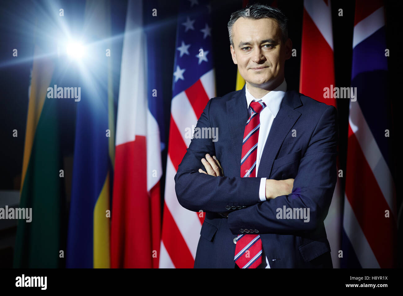 Chairman or political leader in suit looking at camera Stock Photo - Alamy