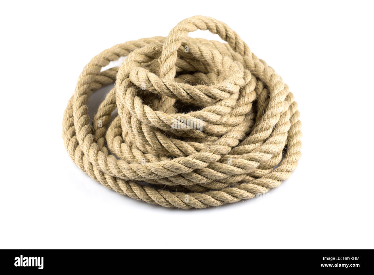 Twisted thick rope isolated on white background Stock Photo - Alamy
