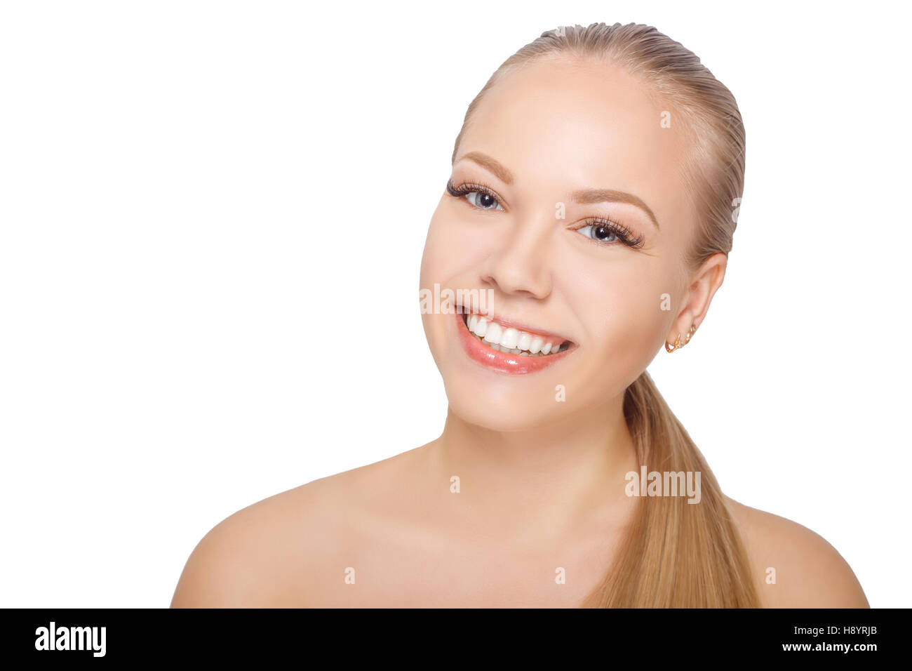 Smiling young scandinavian woman after eyelash Extension Procedure ...