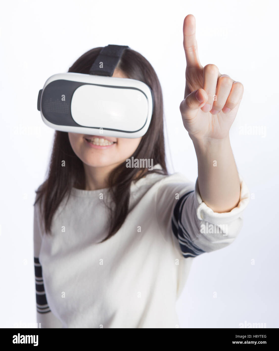asian woman wearing VR headset, giving an action gesture, isolated ...