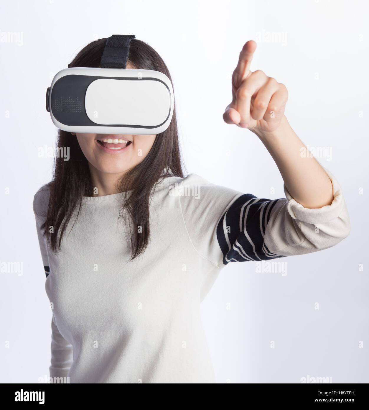 asian woman wearing VR headset, giving an action gesture, isolated ...