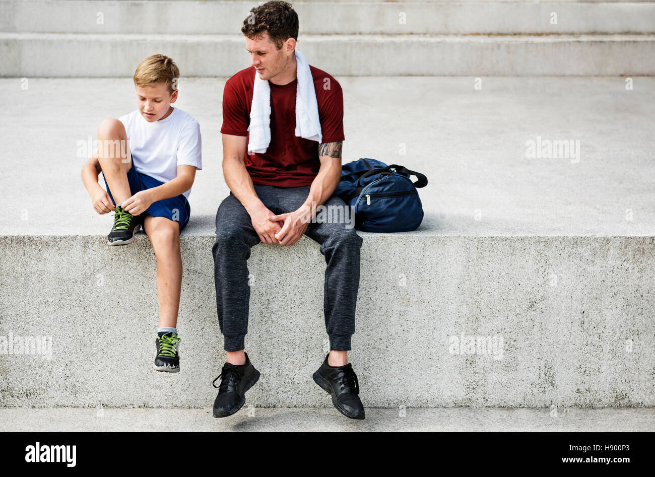Young Boy Trainer Relaxation Lifestyle Concept Stock Photo - Alamy