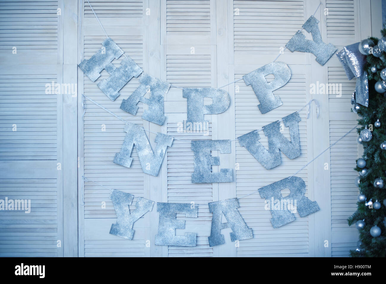 words happy new year on white wooden wall Stock Photo - Alamy