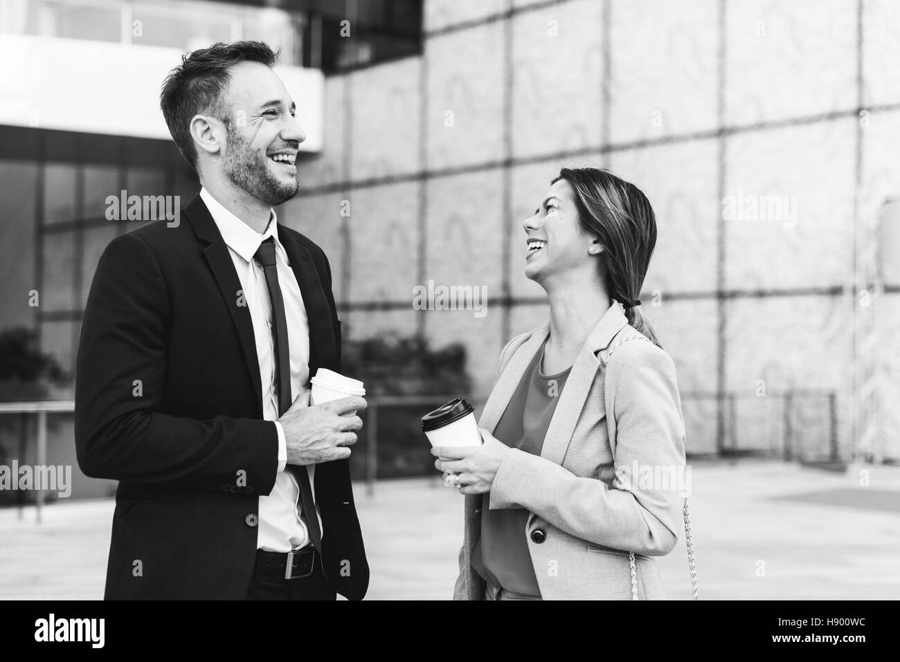 Team office workers discussion Black and White Stock Photos & Images ...
