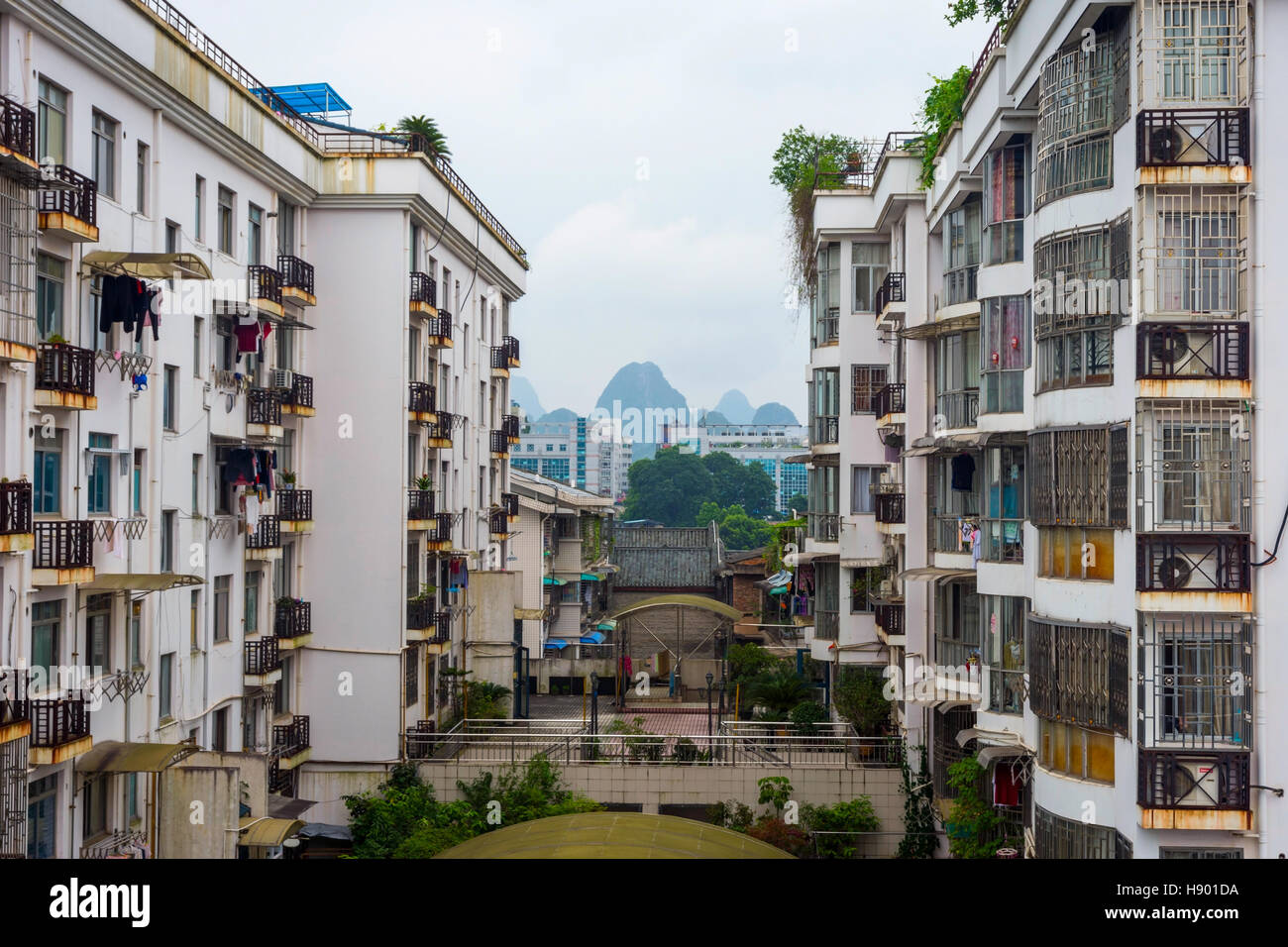 Residential neighborhood buildings in Guilin and famous karst mountain ...